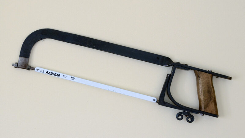 Hand forging a new hacksaw frame