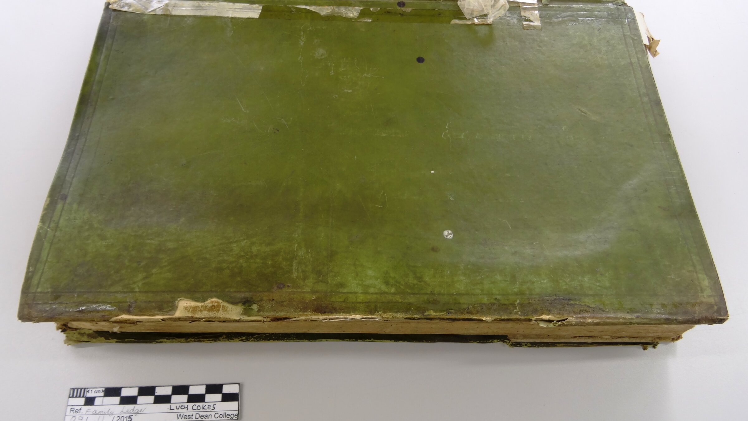 The book Mould discolouration Damage to spine & tape repair
